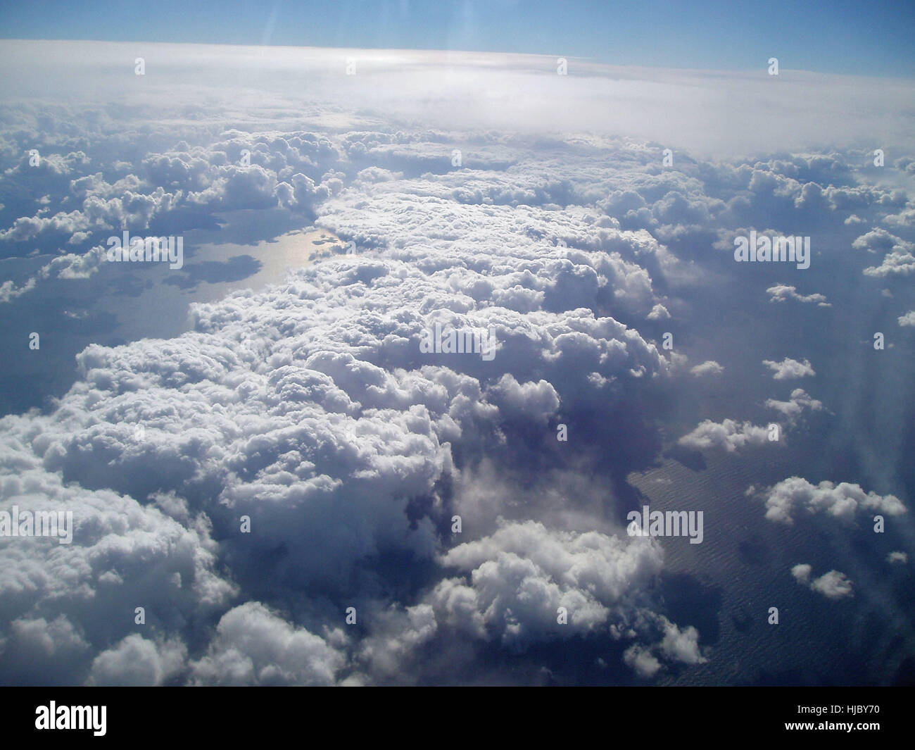 Clouds and Sunshine over Water Stock Photo - Alamy