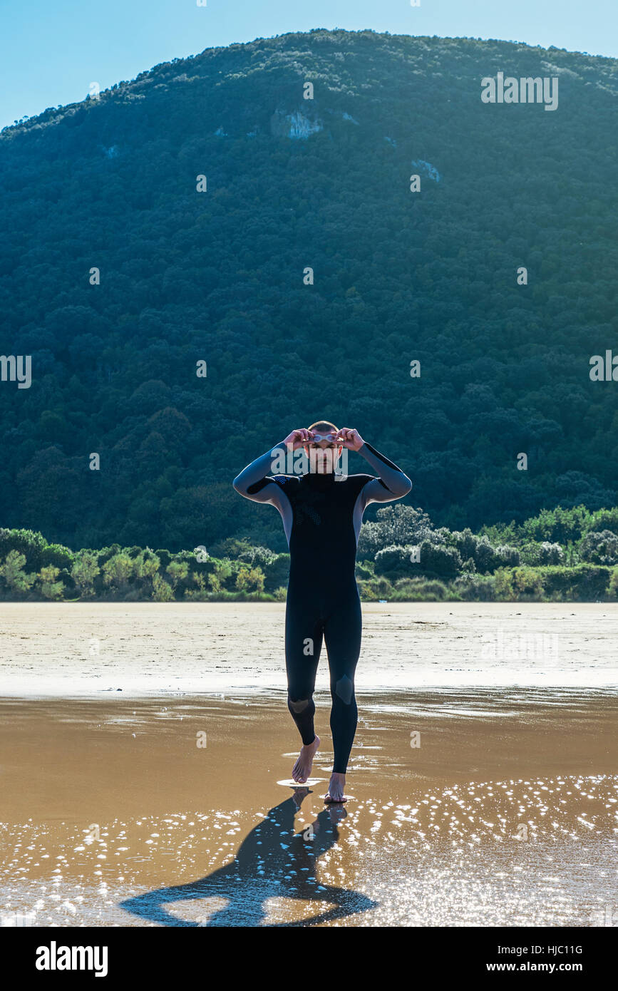 swimmer ready to go swimming in the sea Stock Photo - Alamy