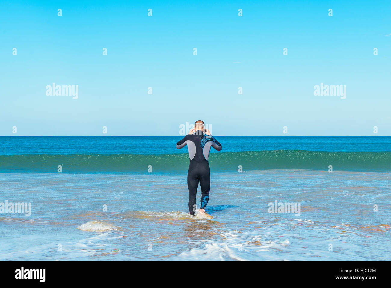 swimmer ready to go swimming in the sea Stock Photo - Alamy