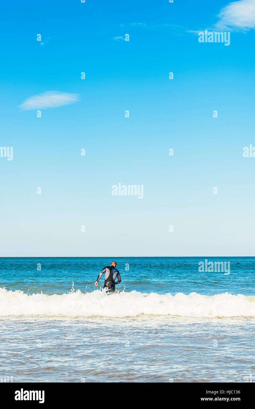 swimmer ready to go swimming in the sea Stock Photo - Alamy