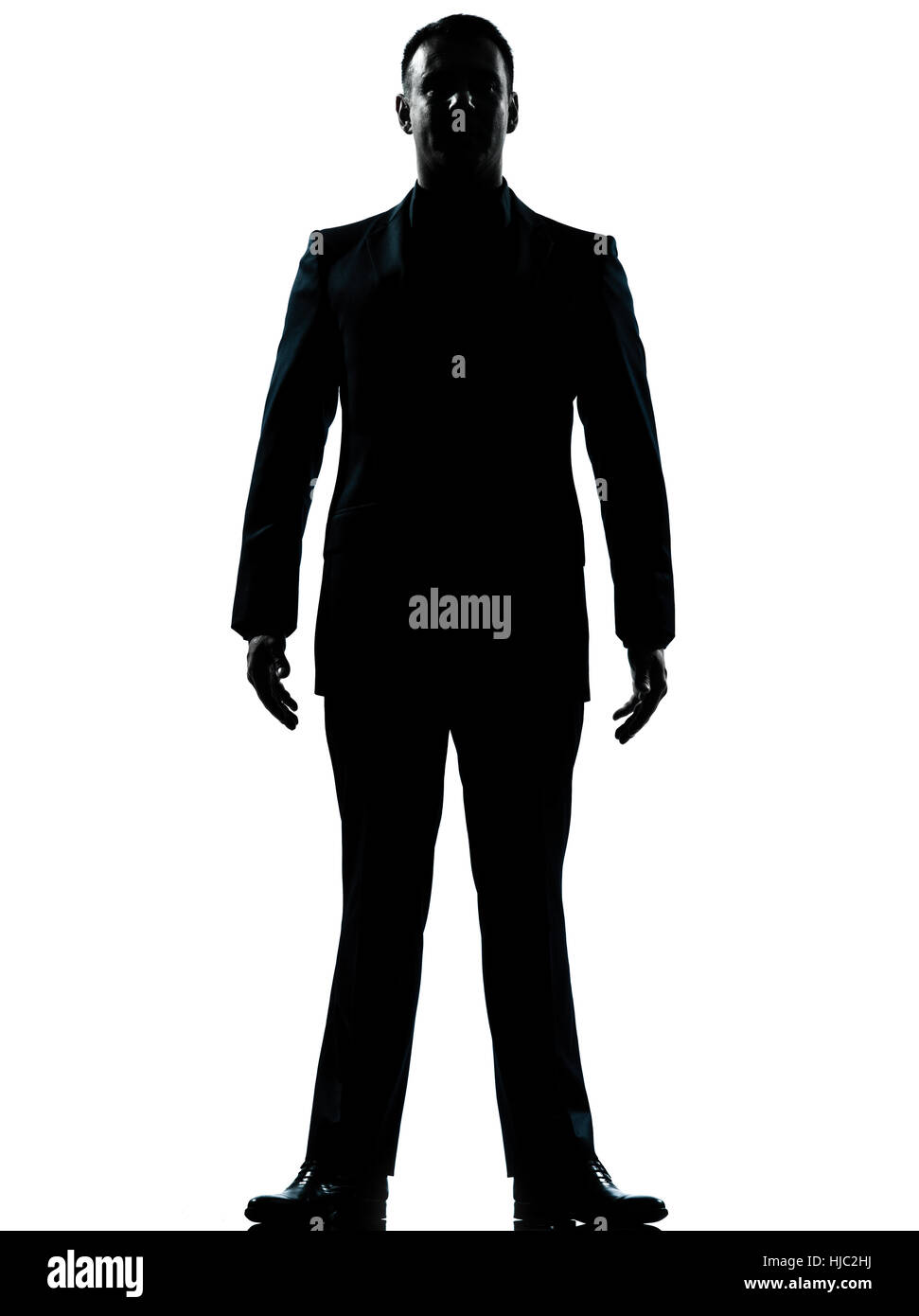 one caucasian business man silhouette standing Full length in studio isolated on white ...