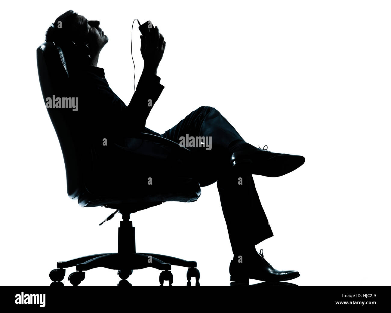 one caucasian business man listening music relaxing silhouette Full ...
