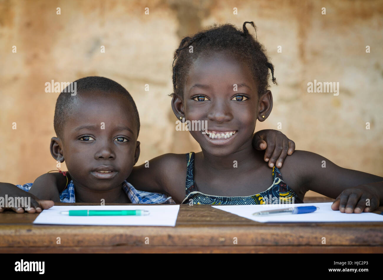 Education Symbol: Couple of African Children Smiling at School. Back To ...