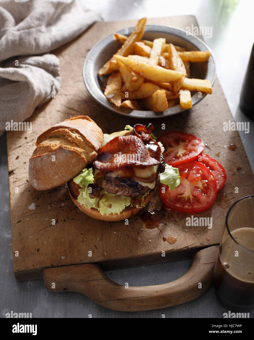 Burger with hand cut chips Stock Photo - Alamy