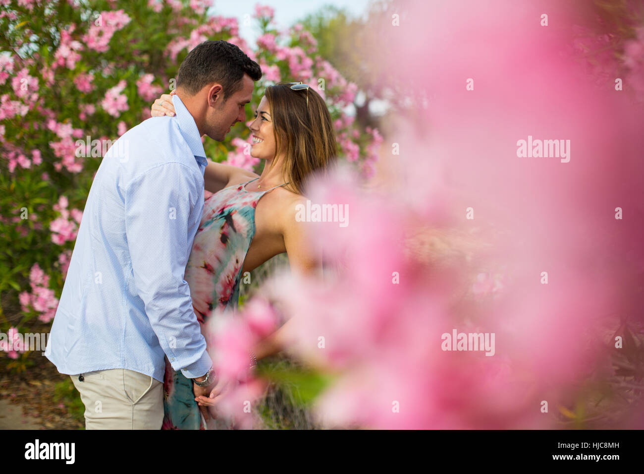 Young romantic couple dancing together hi-res stock photography and ...