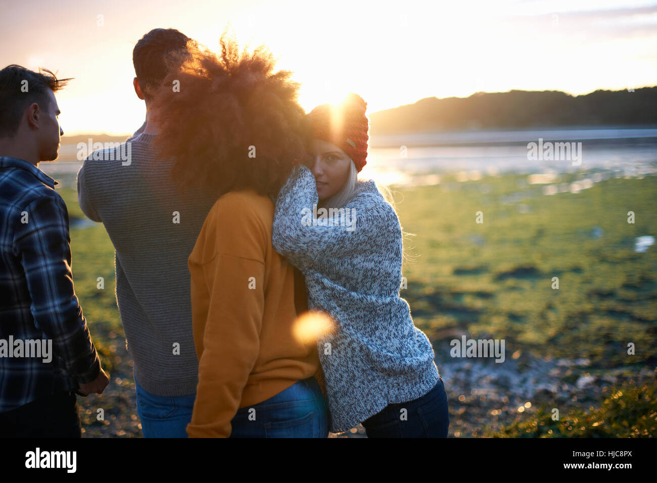 Adult watching sunset hi-res stock photography and images - Alamy