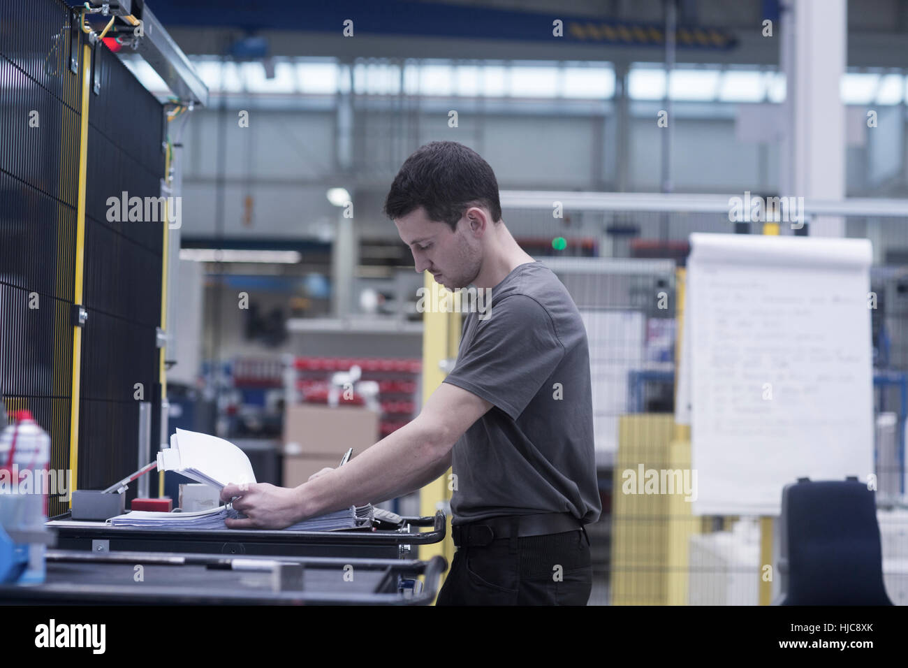 Engineer working in engineering plant Stock Photo - Alamy