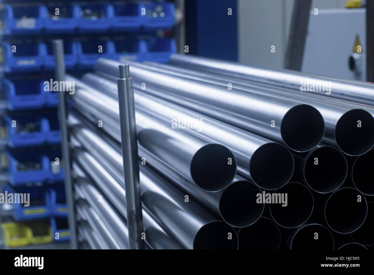 Tubing, stored in engineering plant, close-up Stock Photo - Alamy