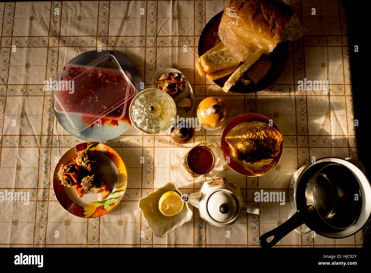 Food, teapot and saucepan on table, overhead view Stock Photo - Alamy