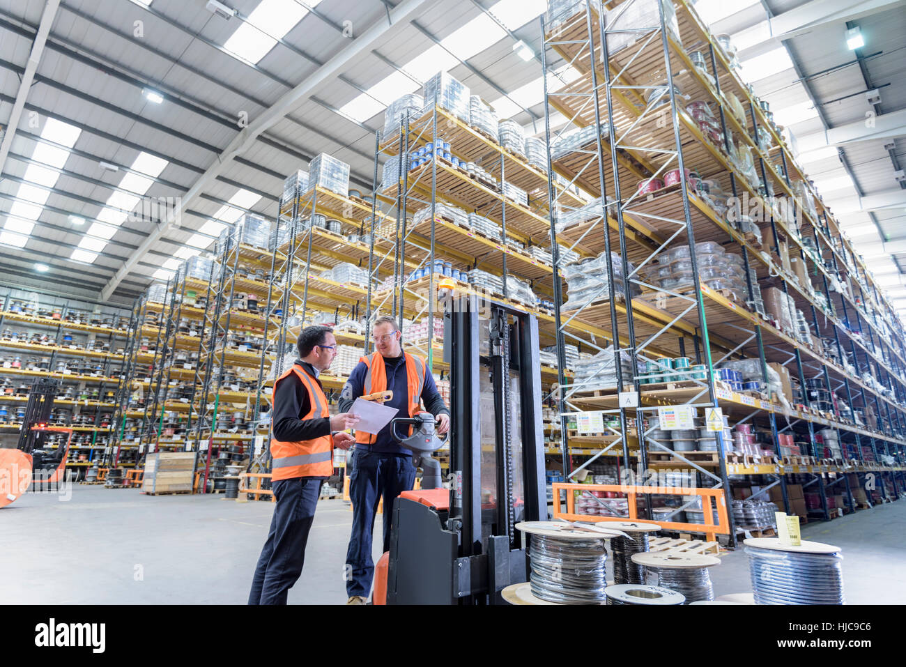 Two men in warehouse hi-res stock photography and images - Alamy