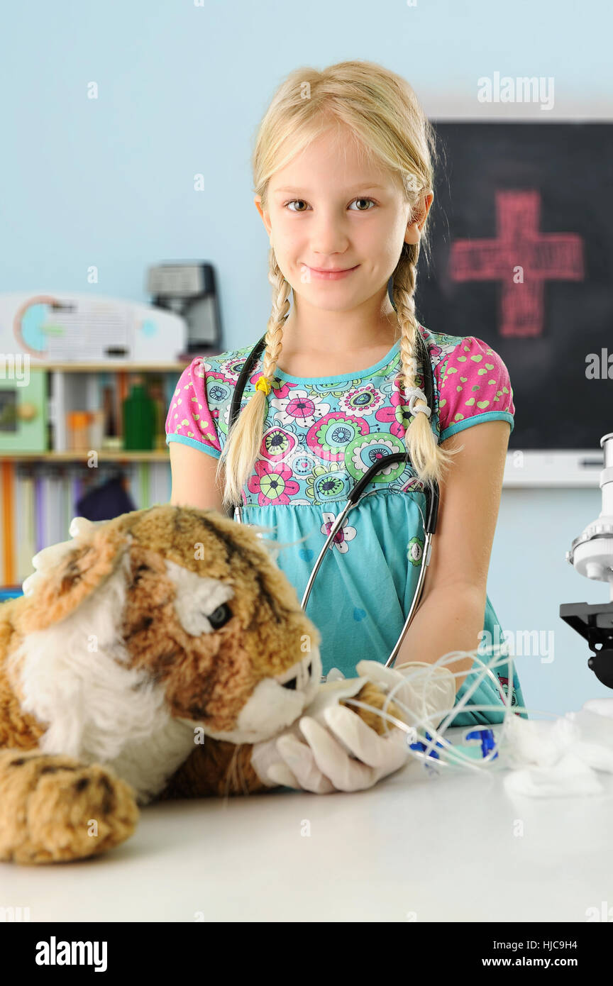 Portrait caucasian female vet wearing hi-res stock photography and ...