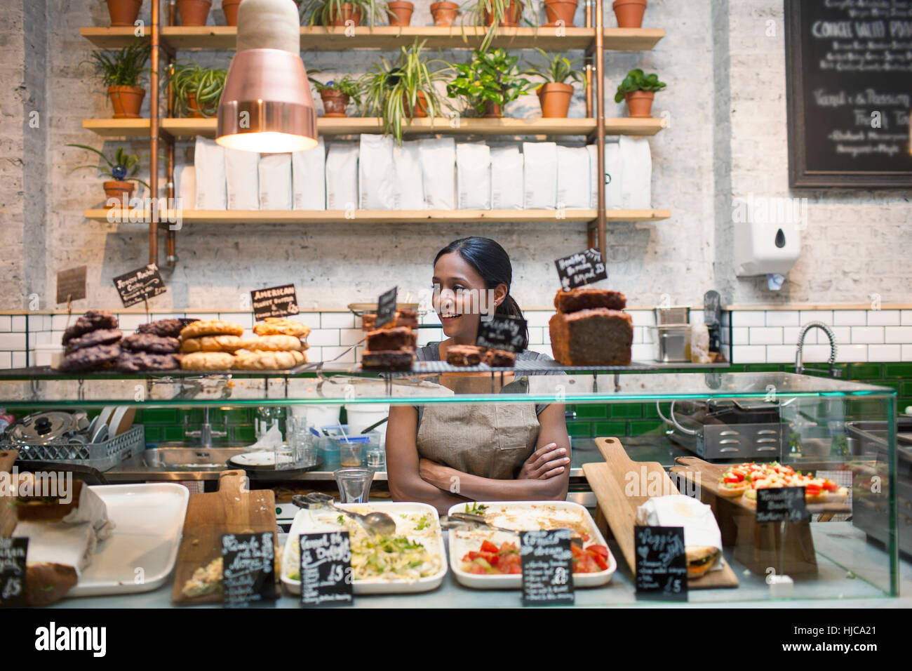 Waitress behind counter hi-res stock photography and images - Alamy