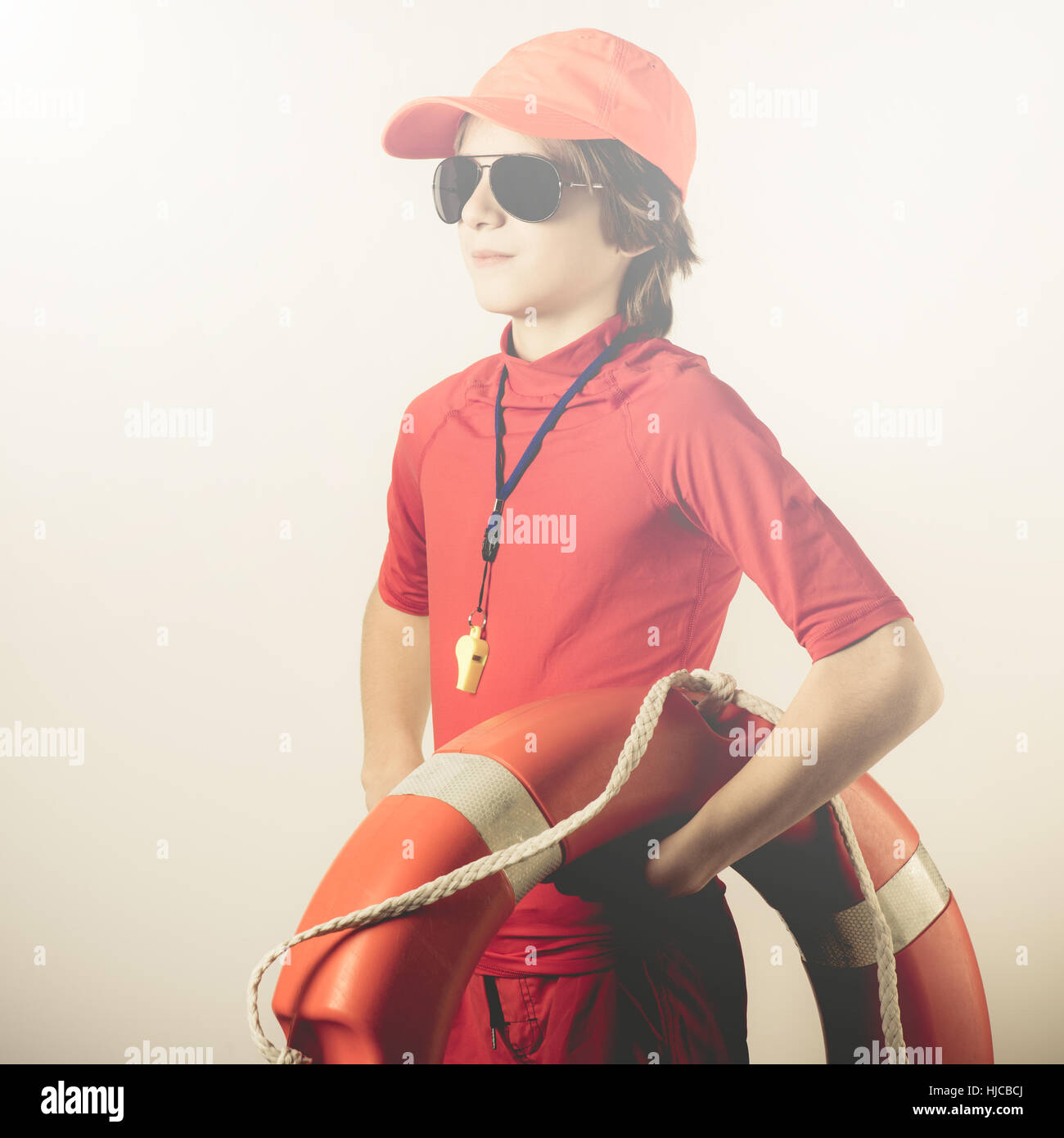 young boy lifeguard Stock Photo - Alamy