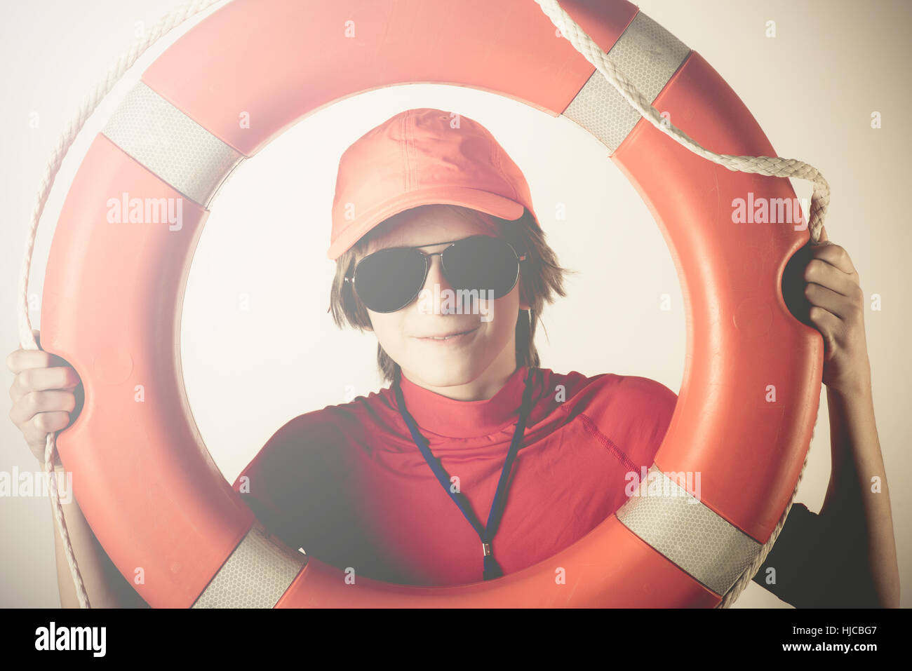 young boy lifeguard Stock Photo - Alamy