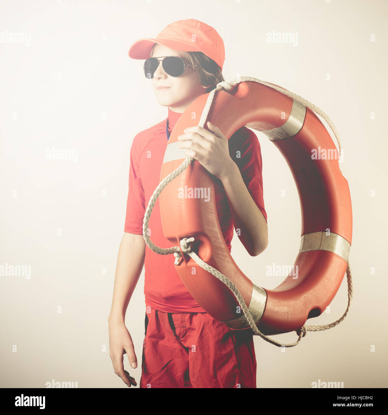 young boy lifeguard Stock Photo - Alamy