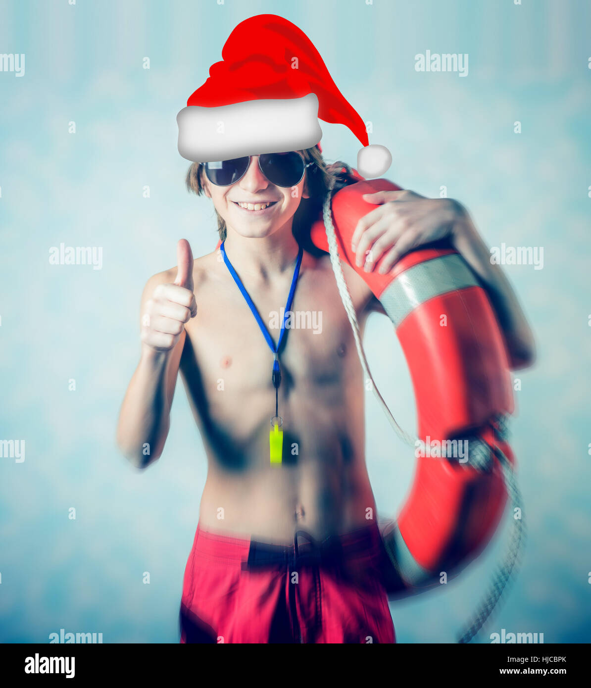 lifeguard boy with equipment Stock Photo - Alamy