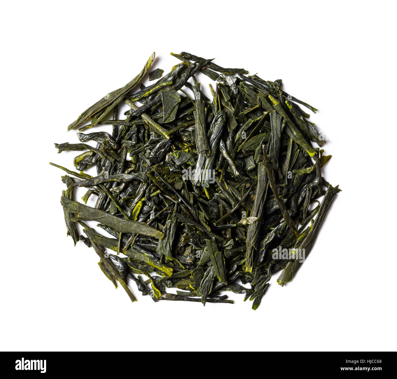Heap of dried leaves green tea japanese sencha isolated on white ...