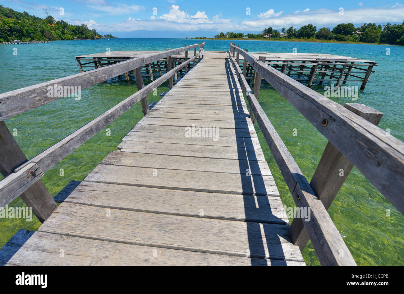 View of a jetty on a beach in Sulawesi, Indonesia Stock Photo - Alamy