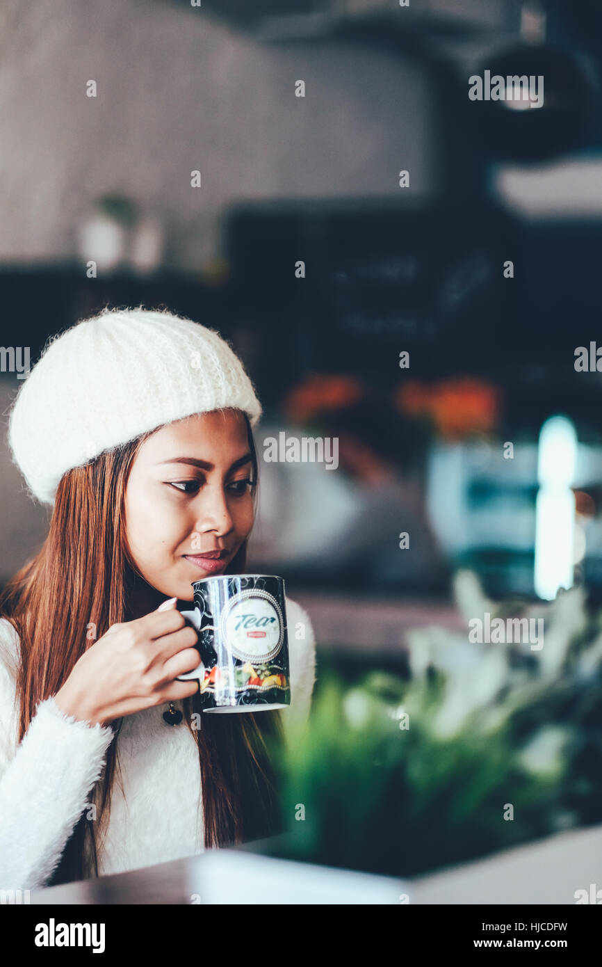 Asian woman drinking tea hi-res stock photography and images - Alamy