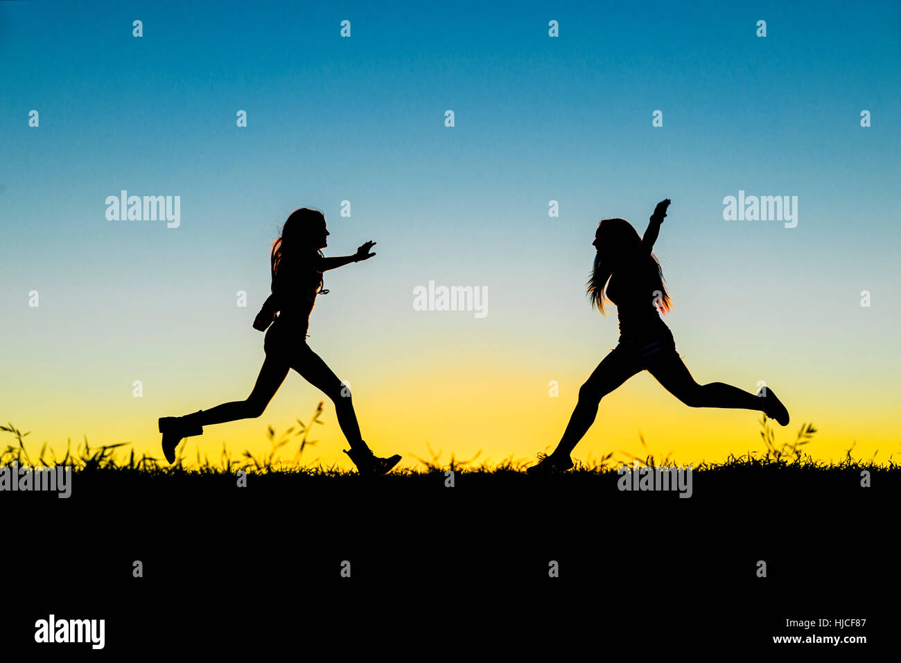 Teen friends having fun in sunset. Concept of female friendship Stock ...