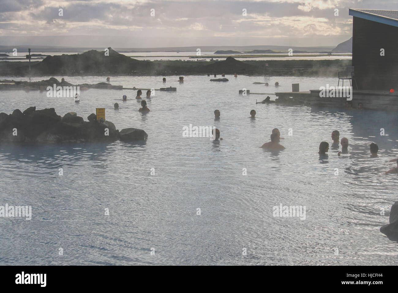 People bathing in the Blue Lagoon geothermal bath resort in Iceland ...