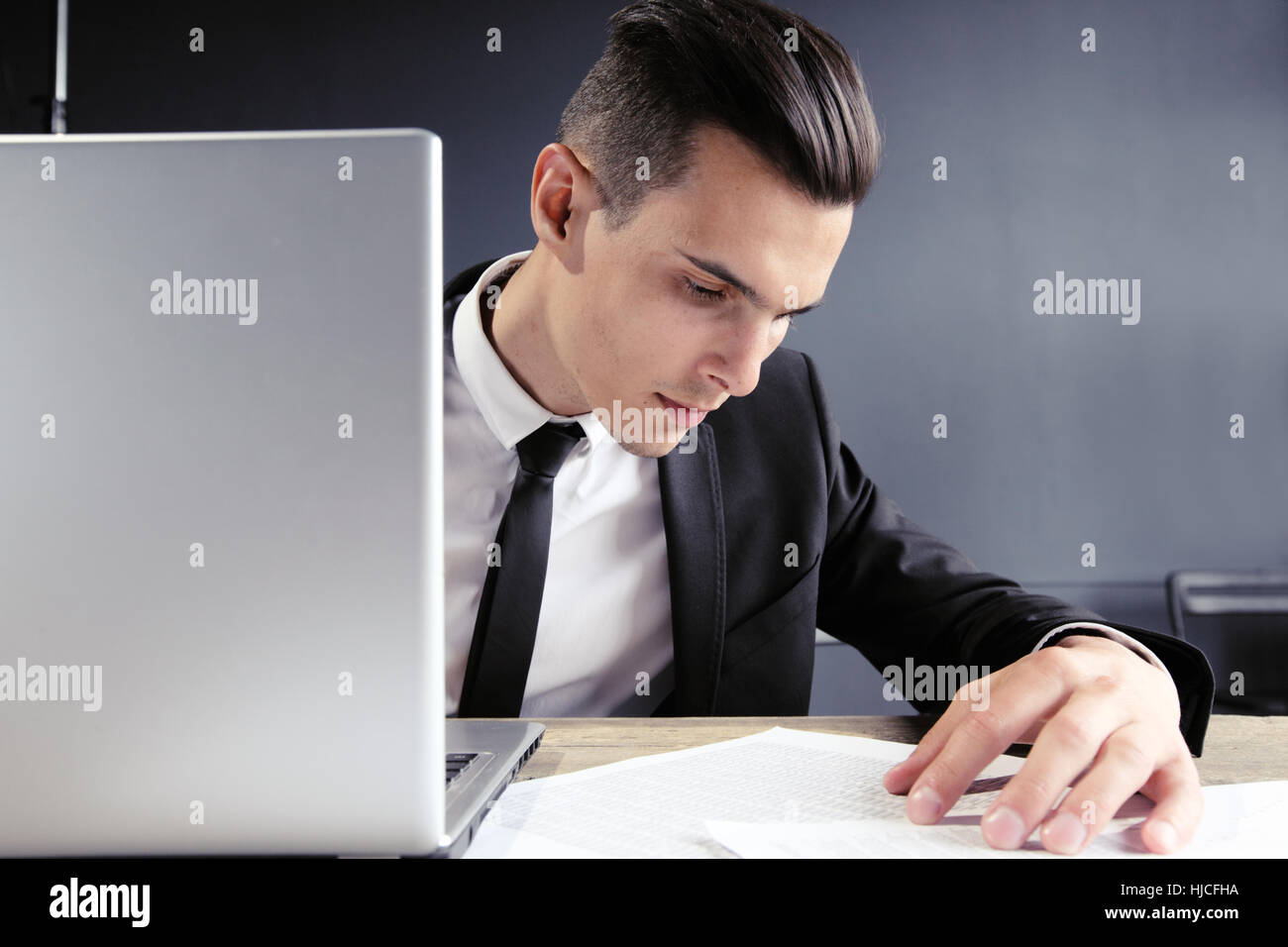 business man working with documents and laptop Stock Photo - Alamy