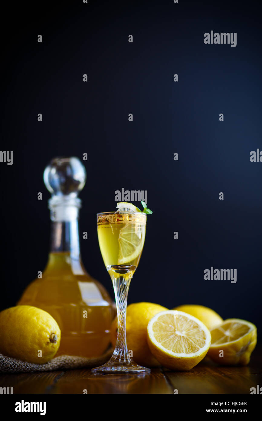 sweet lemon alcoholic brandy in the decanter Stock Photo - Alamy