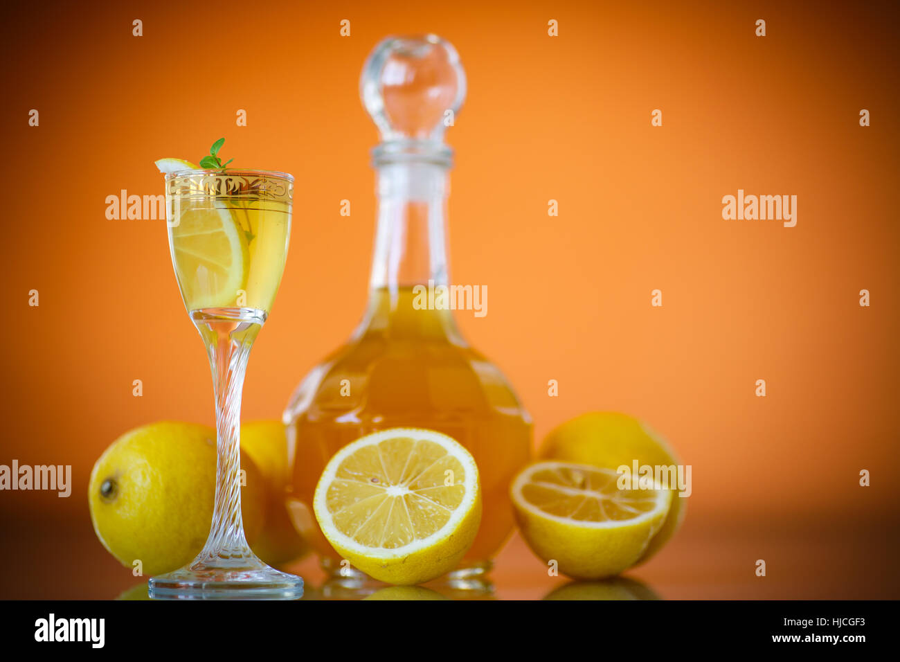 sweet lemon alcoholic brandy in the decanter Stock Photo - Alamy