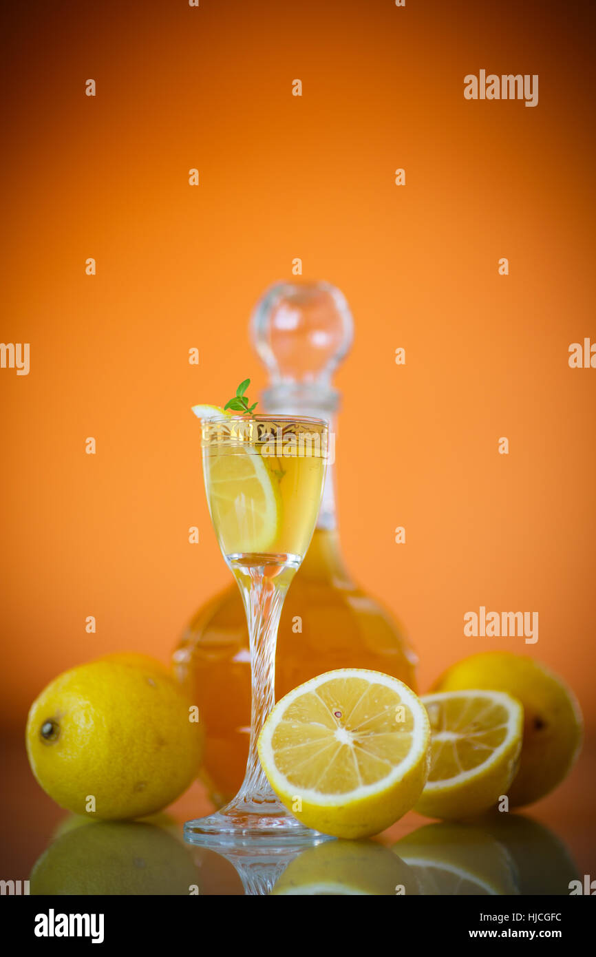 sweet lemon alcoholic brandy in the decanter Stock Photo - Alamy