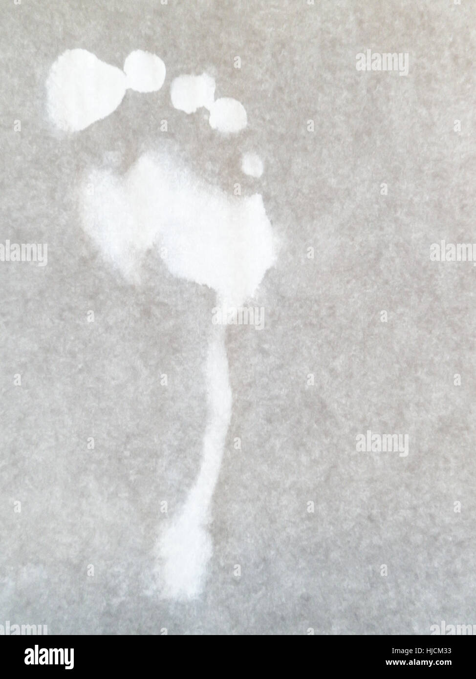 Young human male footprint on paper Stock Photo - Alamy