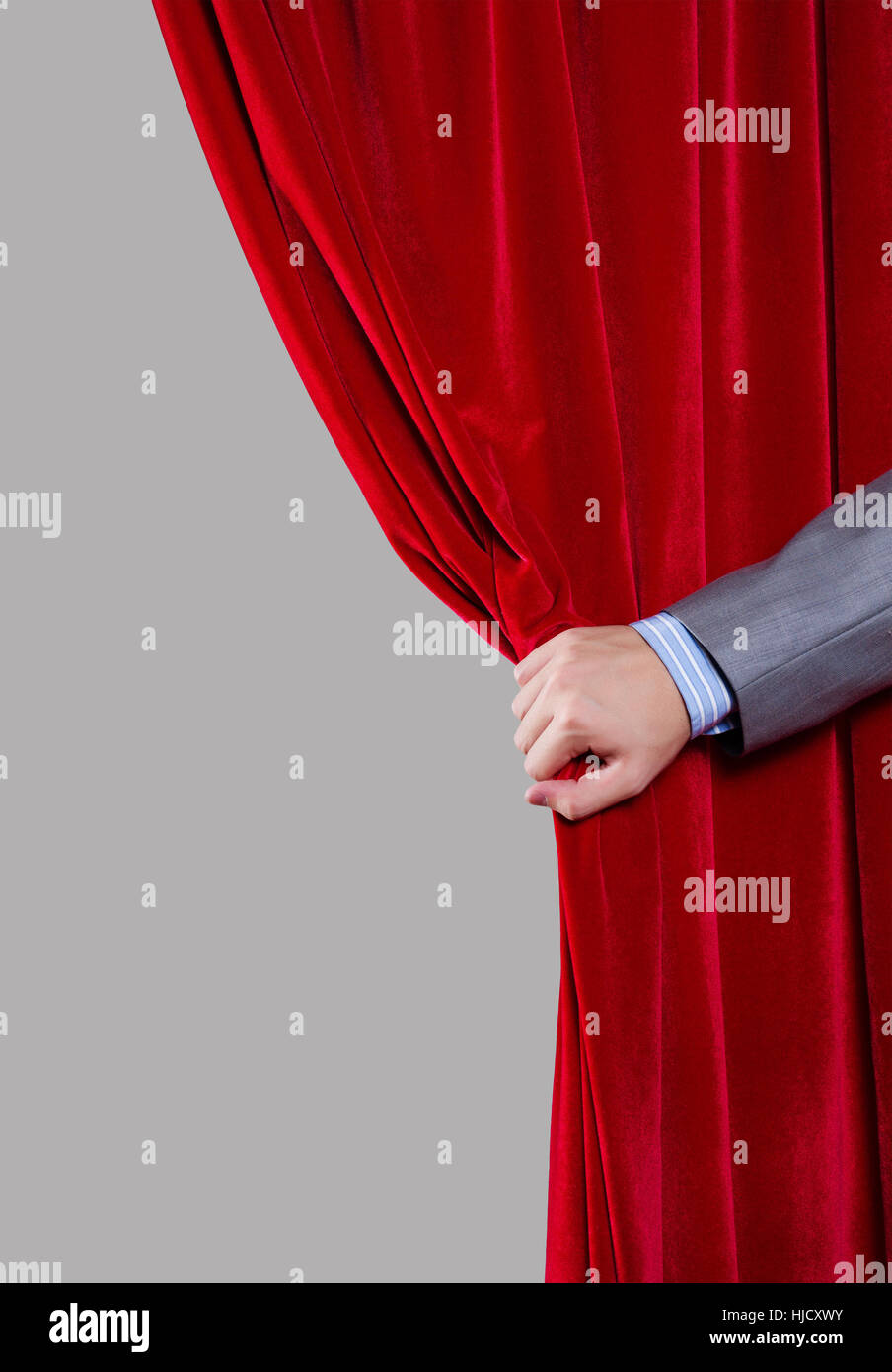 Hand of businessman opening red velvet curtain hi-res stock photography ...