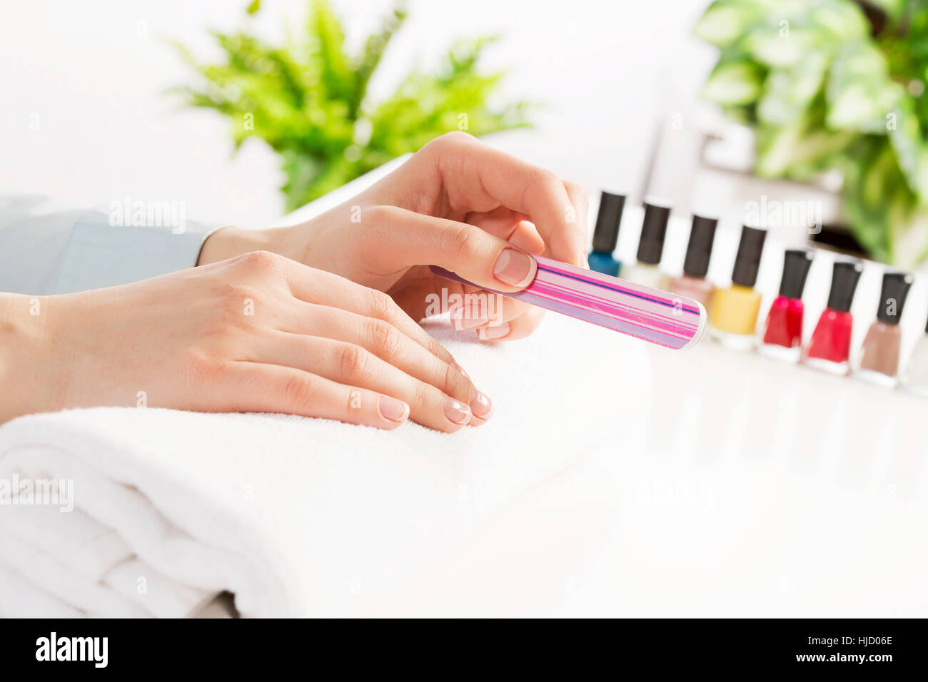 Female hands red manicured hi-res stock photography and images - Alamy