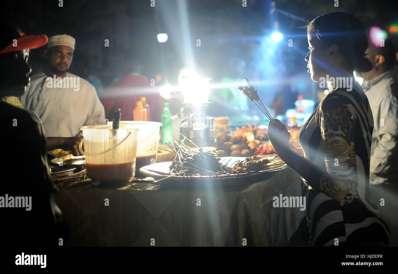 Seafood on skewers, bread and vegetables at the Forodhani Night Market ...