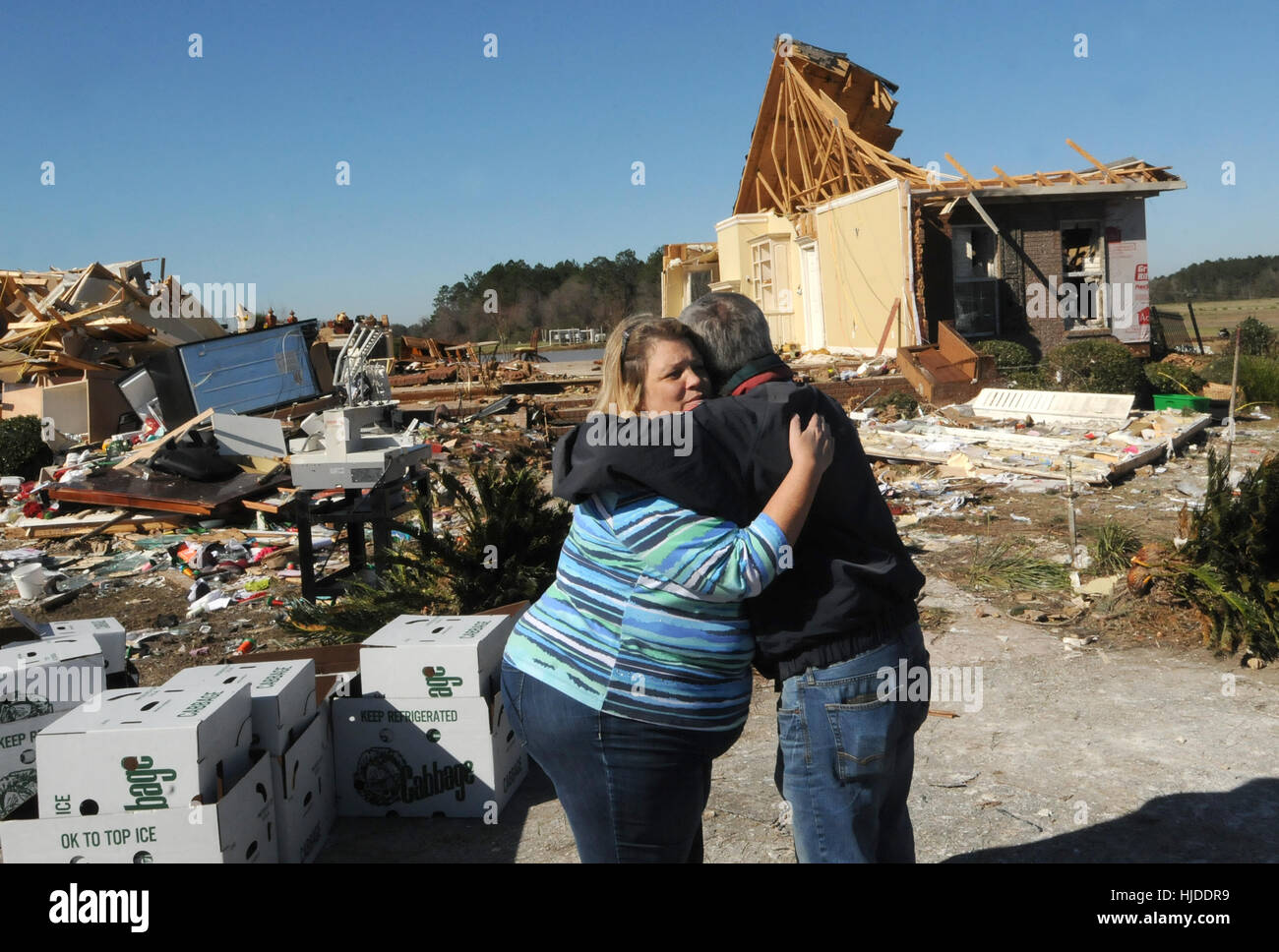 Adel, Georgia. 24th Jan, 2017. Carla Bullard and a friend embrace, 2017 ...