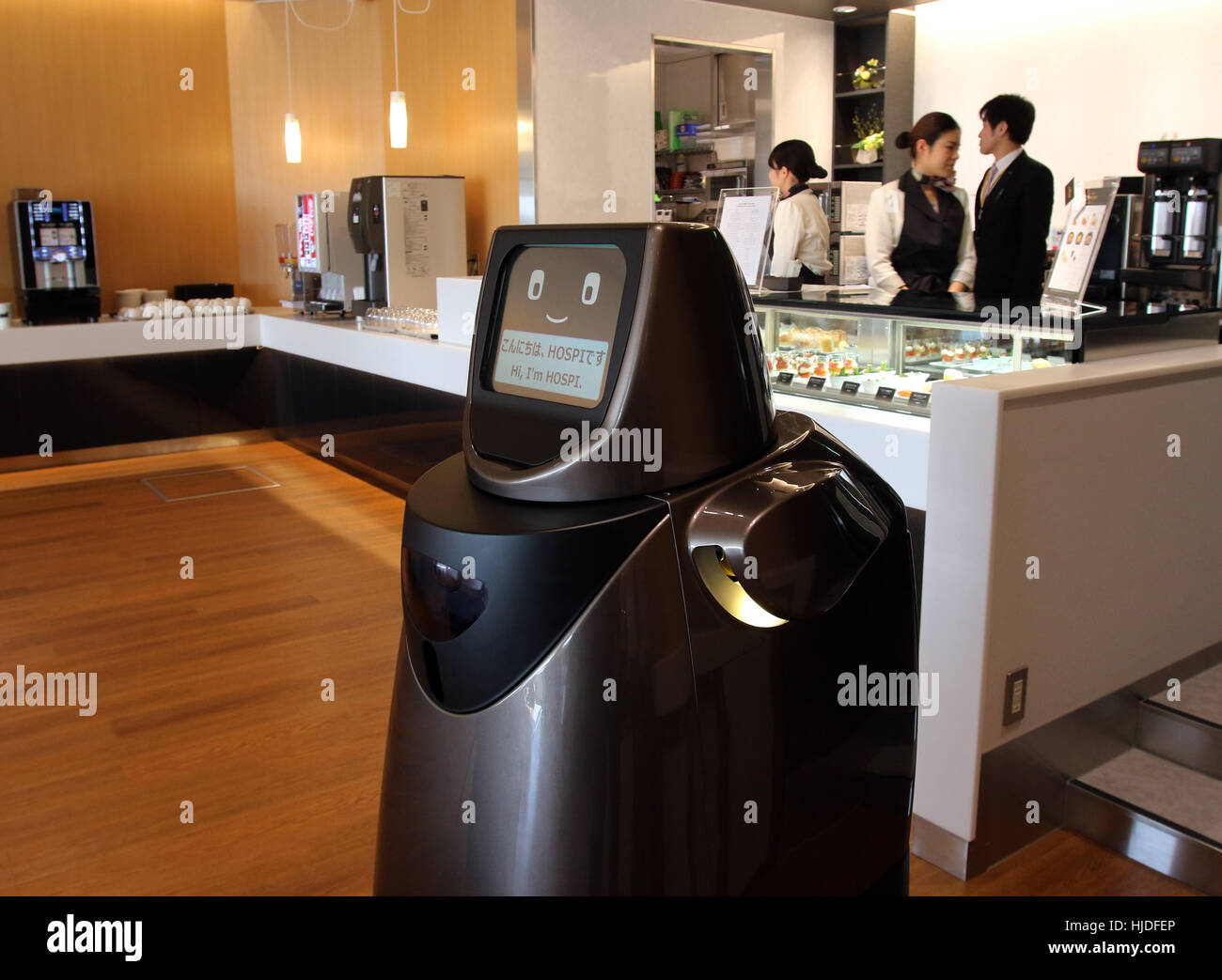 Narita, Japan. 24th Jan, 2017. Panasonic's transport robot HOSPI ...