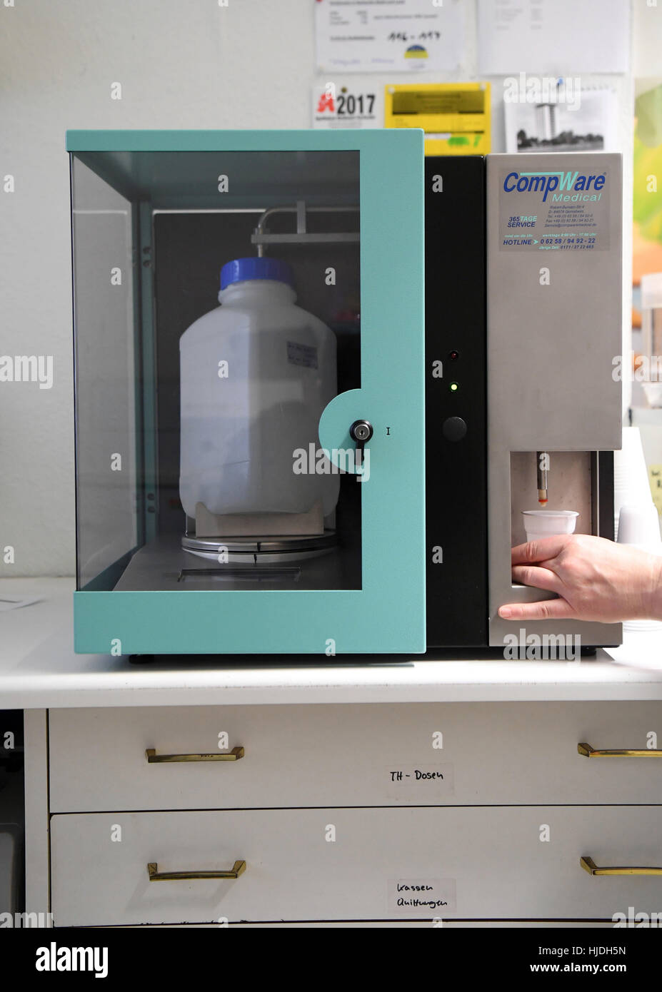 A methadone machine fills up a dosis at a medical praxis in Karlsruhe ...