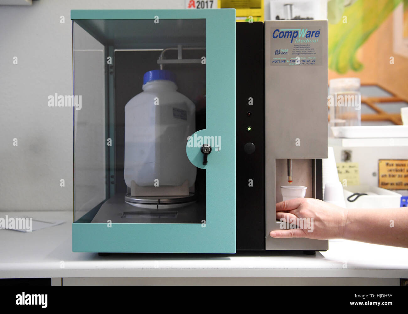 A methadone machine fills up a dosis at a medical praxis in Karlsruhe ...