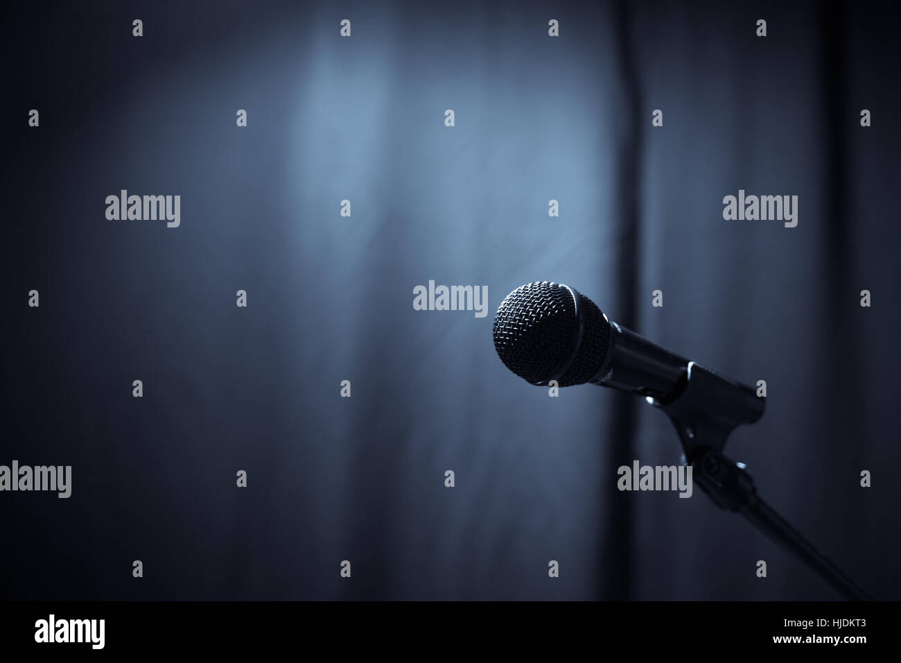 Close up shot of a microphone on a stand Stock Photo - Alamy