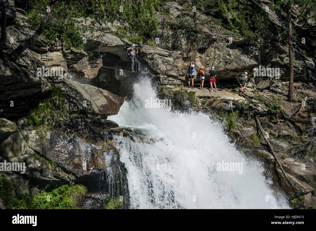 Climber, rope, waterfall Stock Photo - Alamy