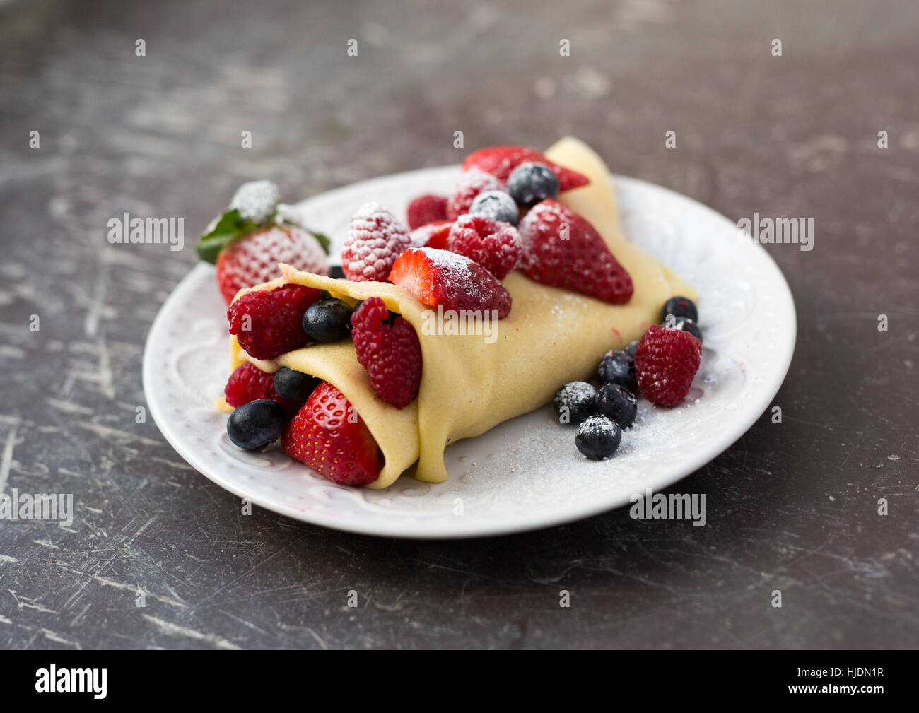 Summer berry crepe on a plate Stock Photo - Alamy