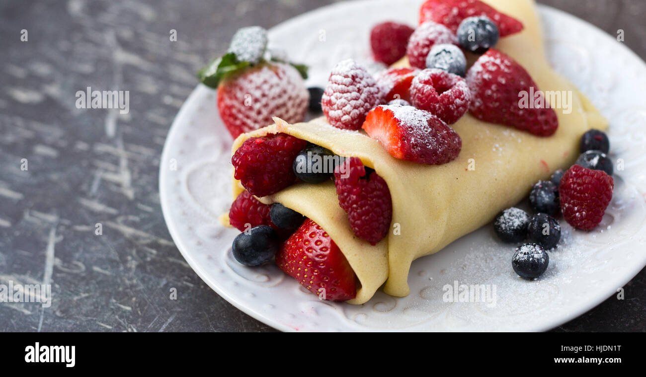 Summer berry crepe on a plate Stock Photo - Alamy