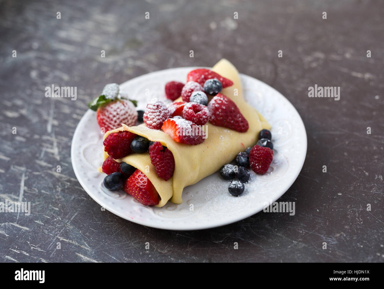 Summer berry crepe on a plate Stock Photo - Alamy
