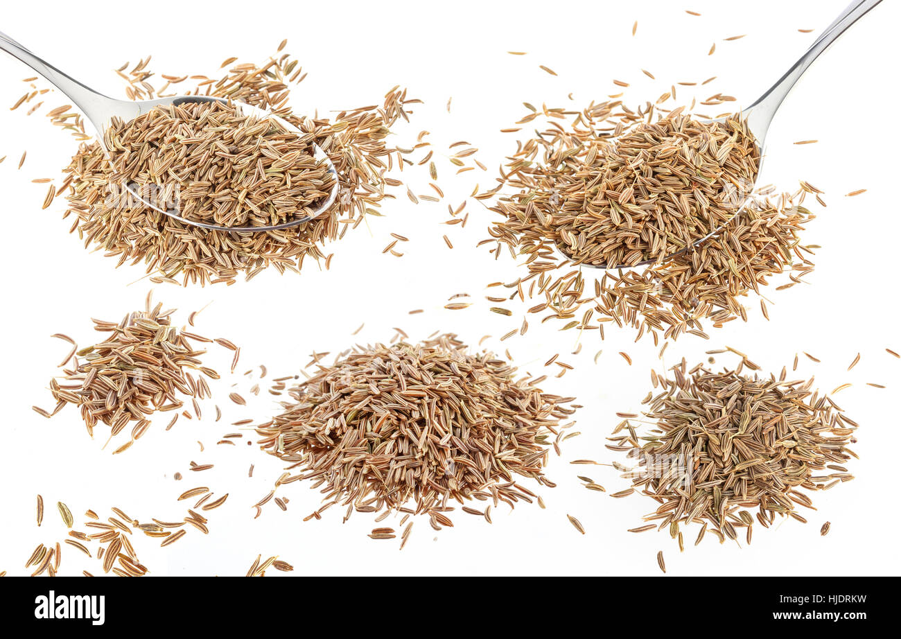 Cumin seeds isolated on white background Stock Photo - Alamy
