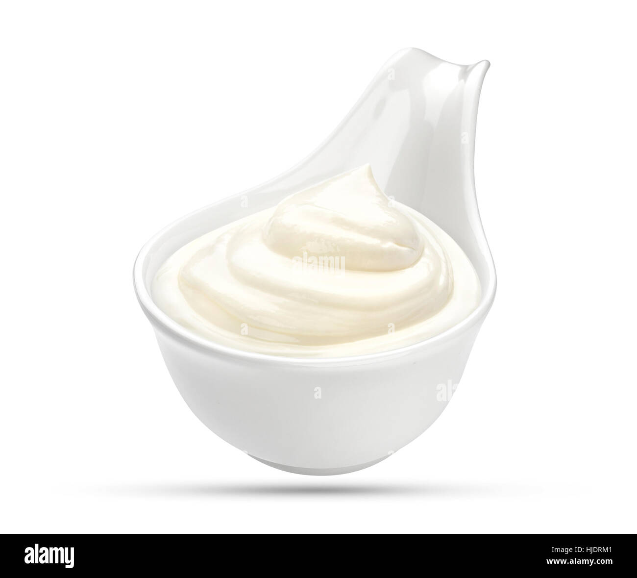 Sour cream on white background Stock Photo - Alamy