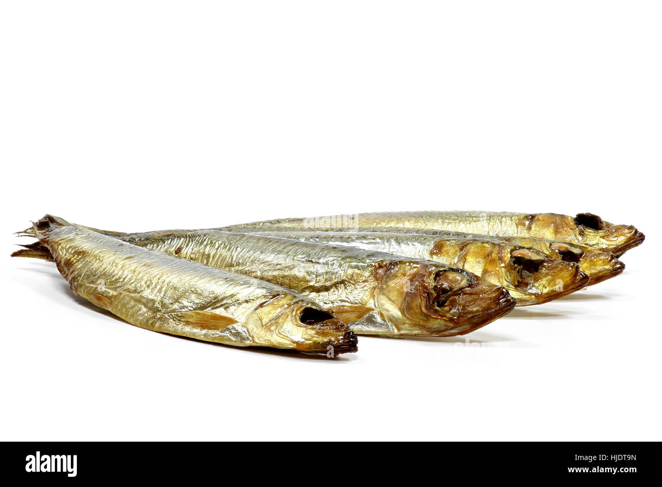 smoked sprats isolated on white background Stock Photo - Alamy