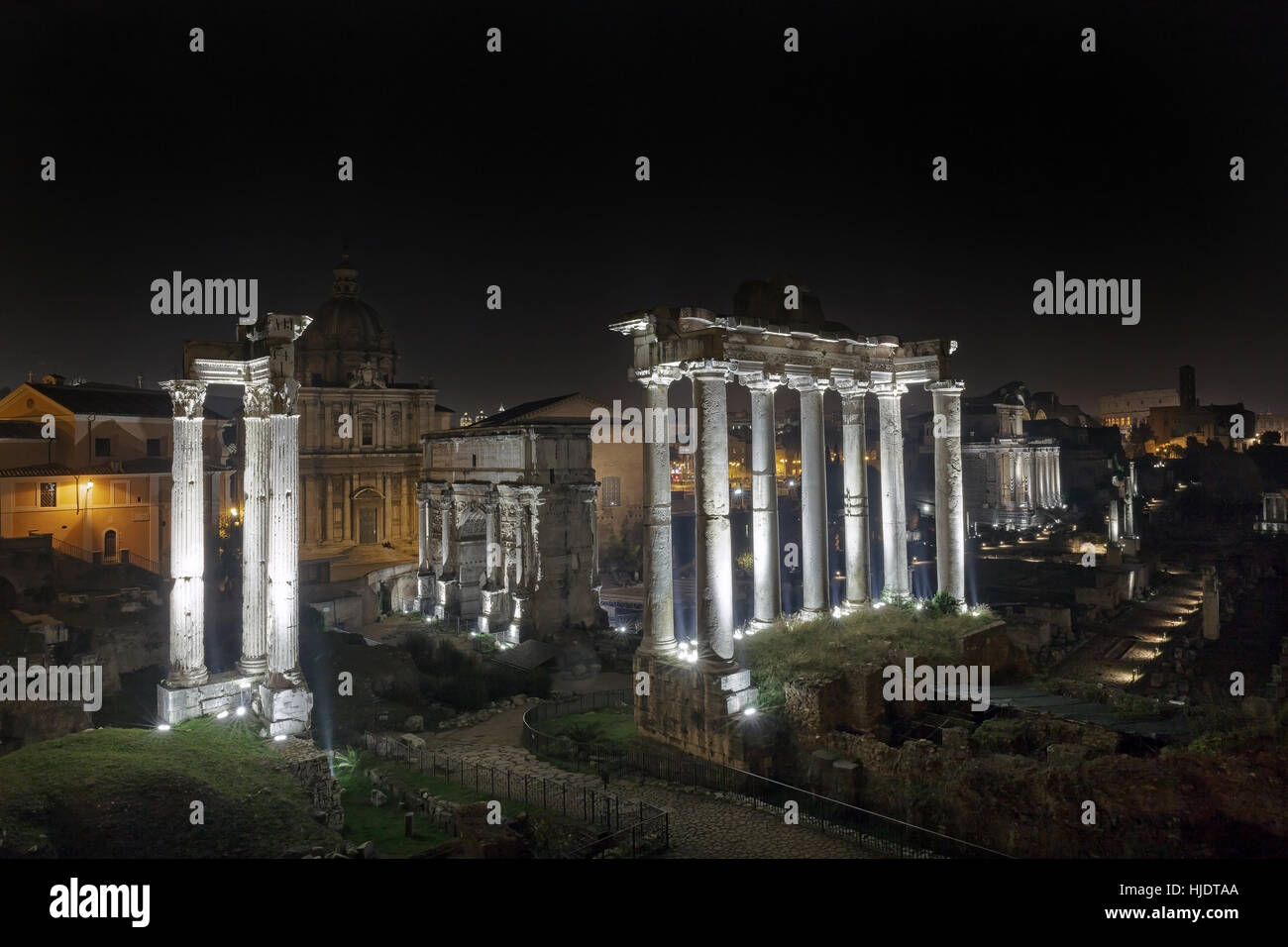 The Roman Forum photographed at night with artificial lights. The Roman ...