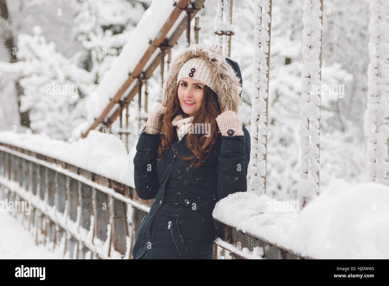 Winter portrait of a beautiful woman in the snowfall Stock Photo - Alamy