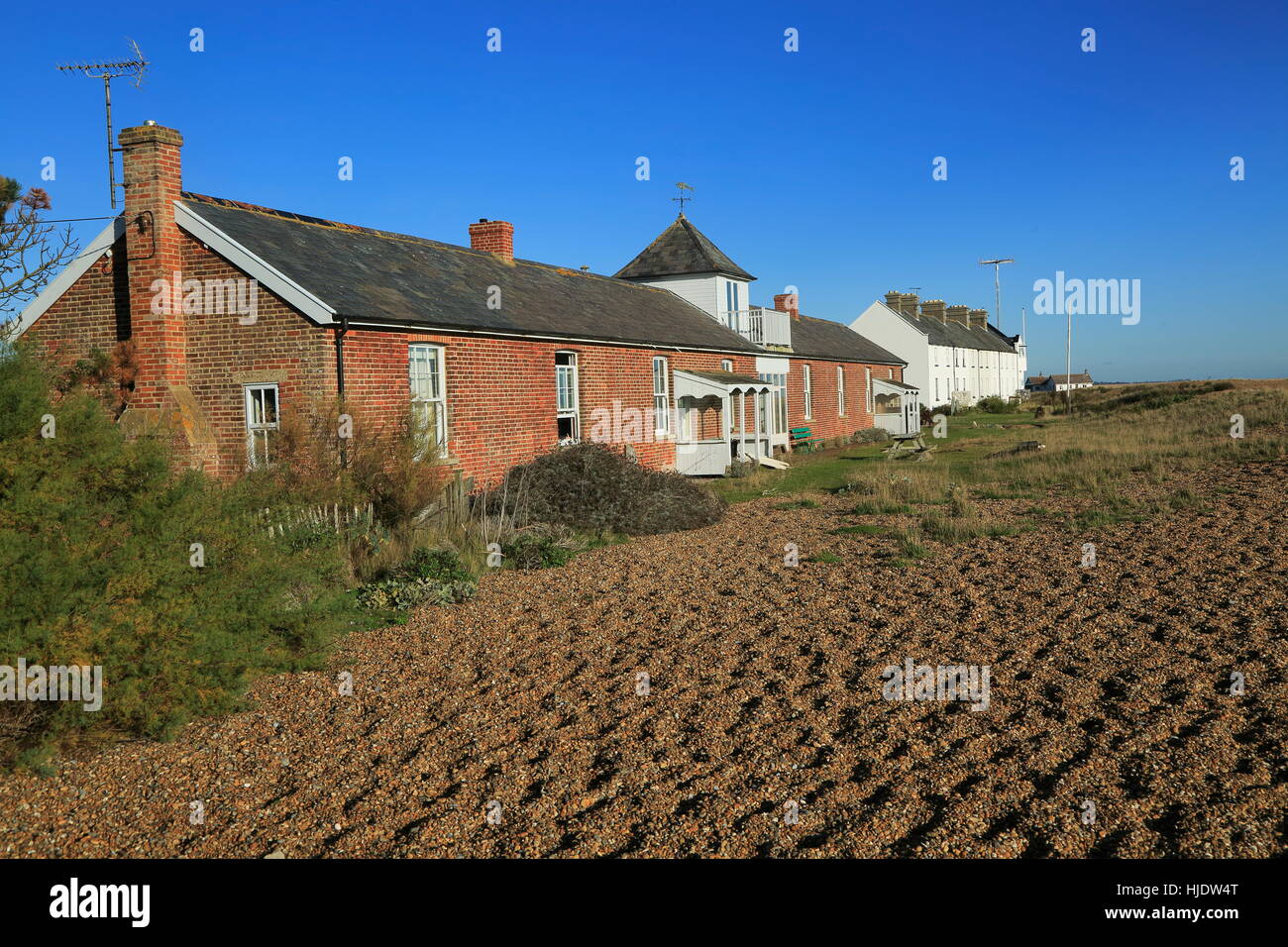 Beach housing on the coast, Shingle Street, Suffolk, England, UK Stock ...