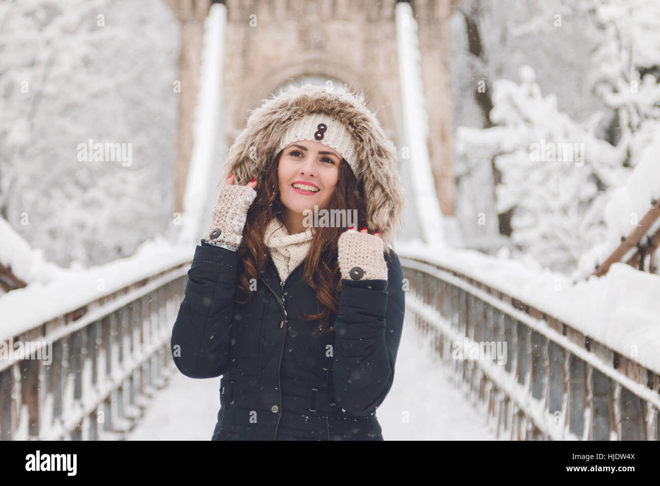 Winter portrait of a beautiful woman in the snowfall Stock Photo - Alamy