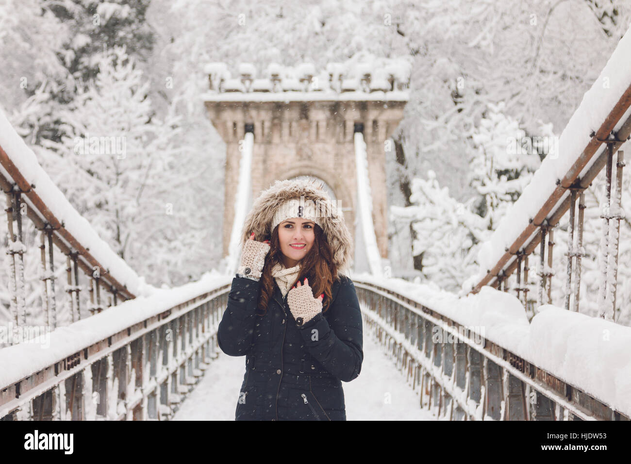 Winter portrait of a beautiful woman in the snowfall Stock Photo - Alamy